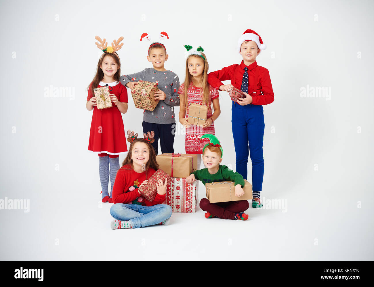 Children giving gifts hi-res stock photography and images - Alamy