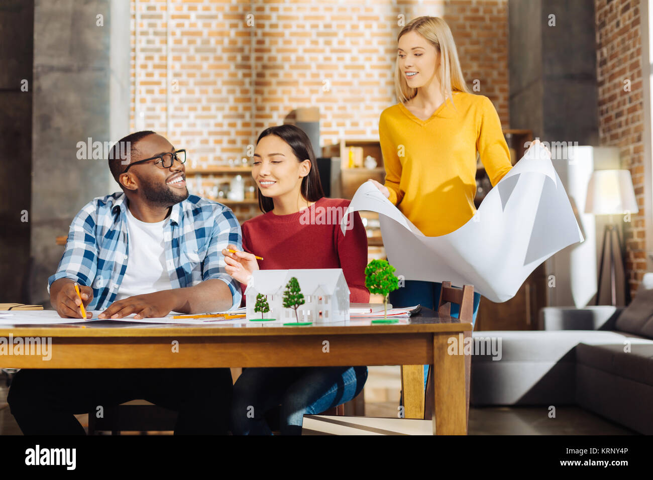 Three gay colleagues sharing his views Stock Photo - Alamy