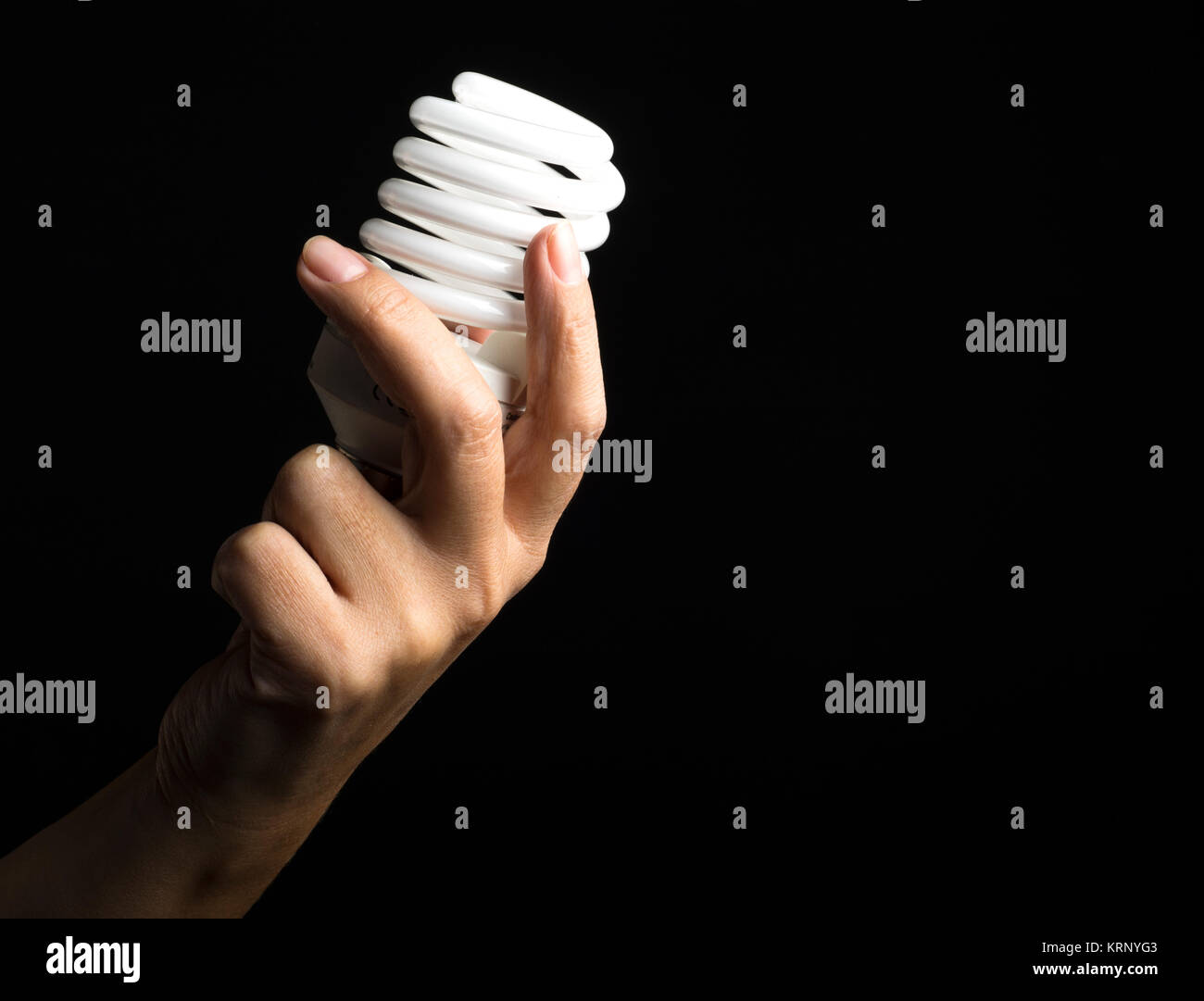 white bulb on hand Stock Photo - Alamy
