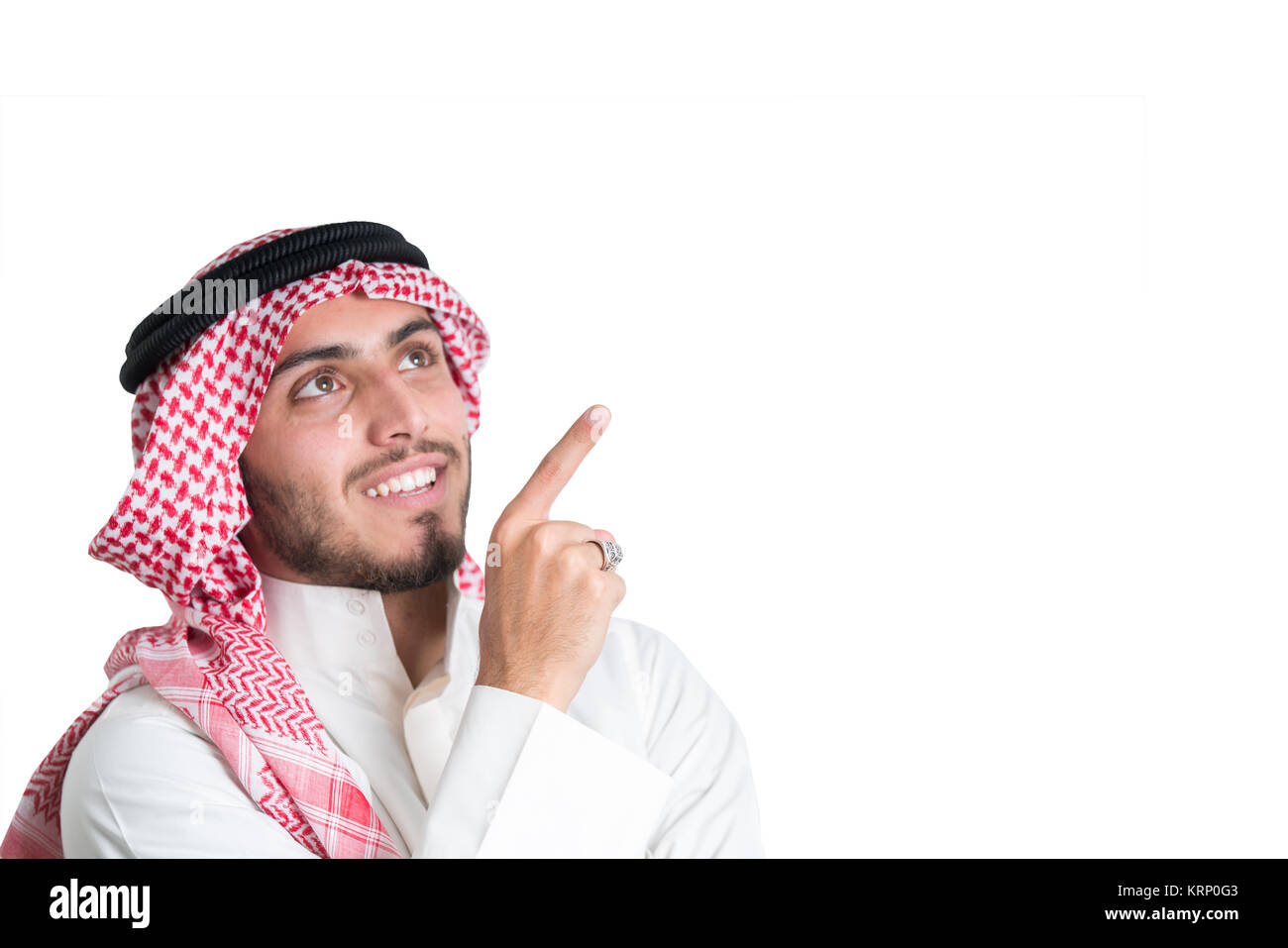 Young arab pointing. concept, isolated Stock Photo - Alamy