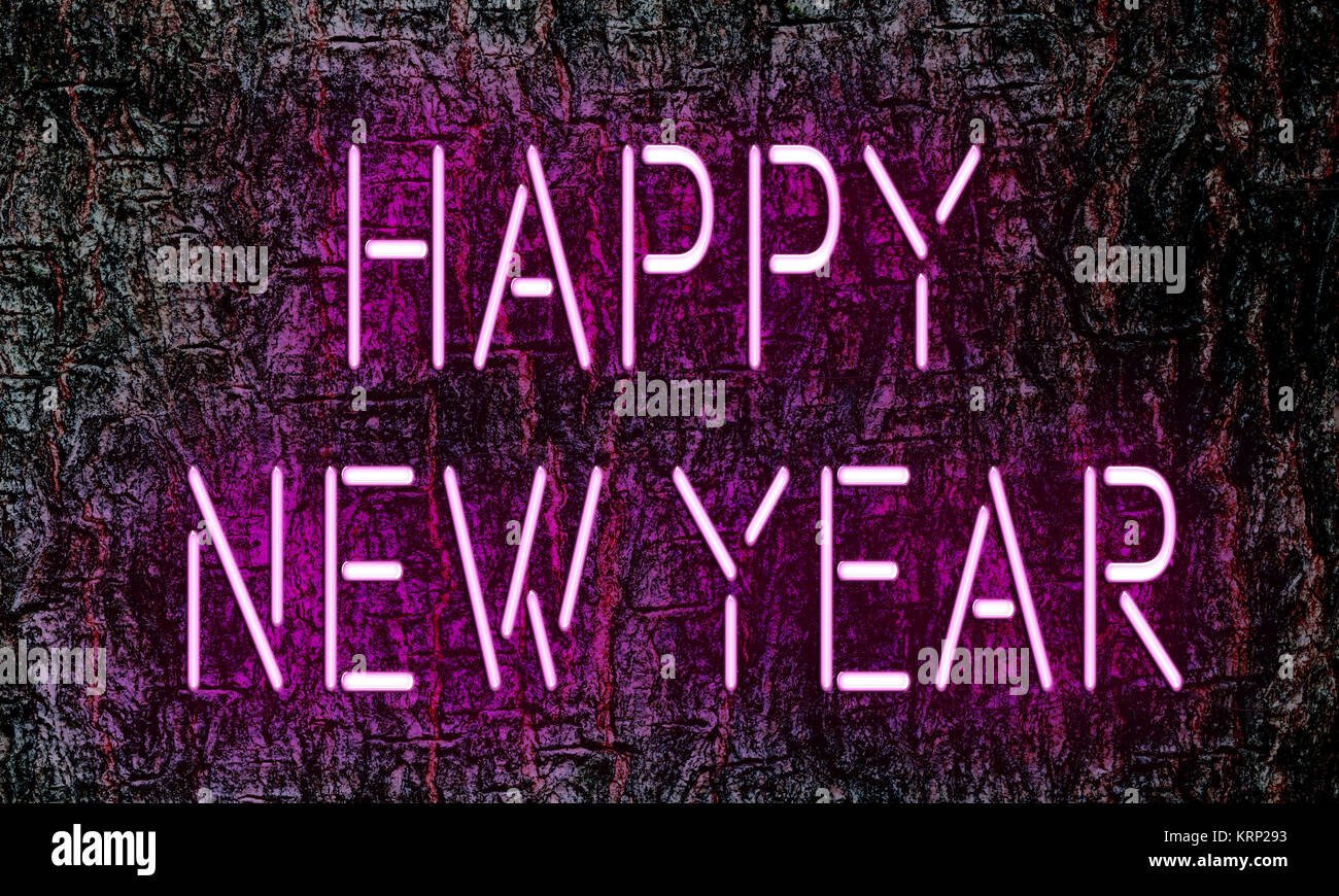 Pink glowing neon light with New Year concept on plant texture ...