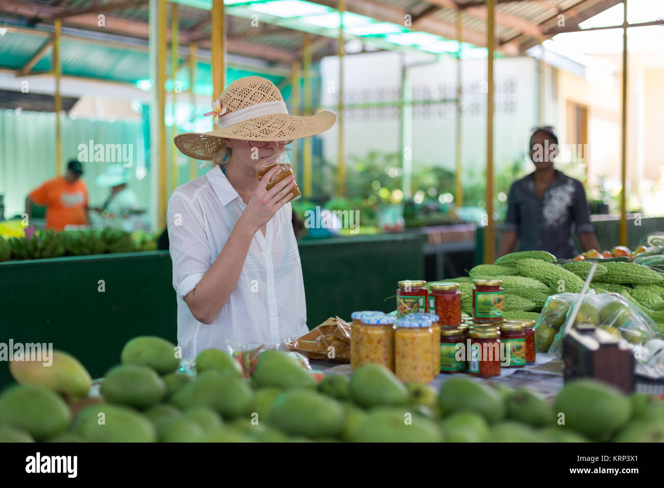 Traveler shopping on traditional Victoria food market, Seychelles Stock ...