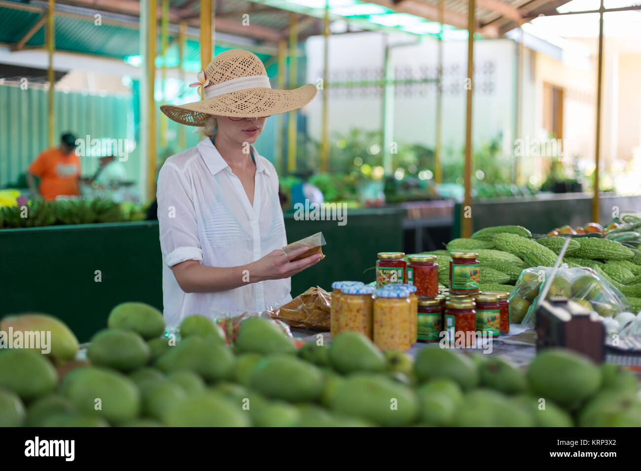 Traveler shopping on traditional Victoria food market, Seychelles Stock ...