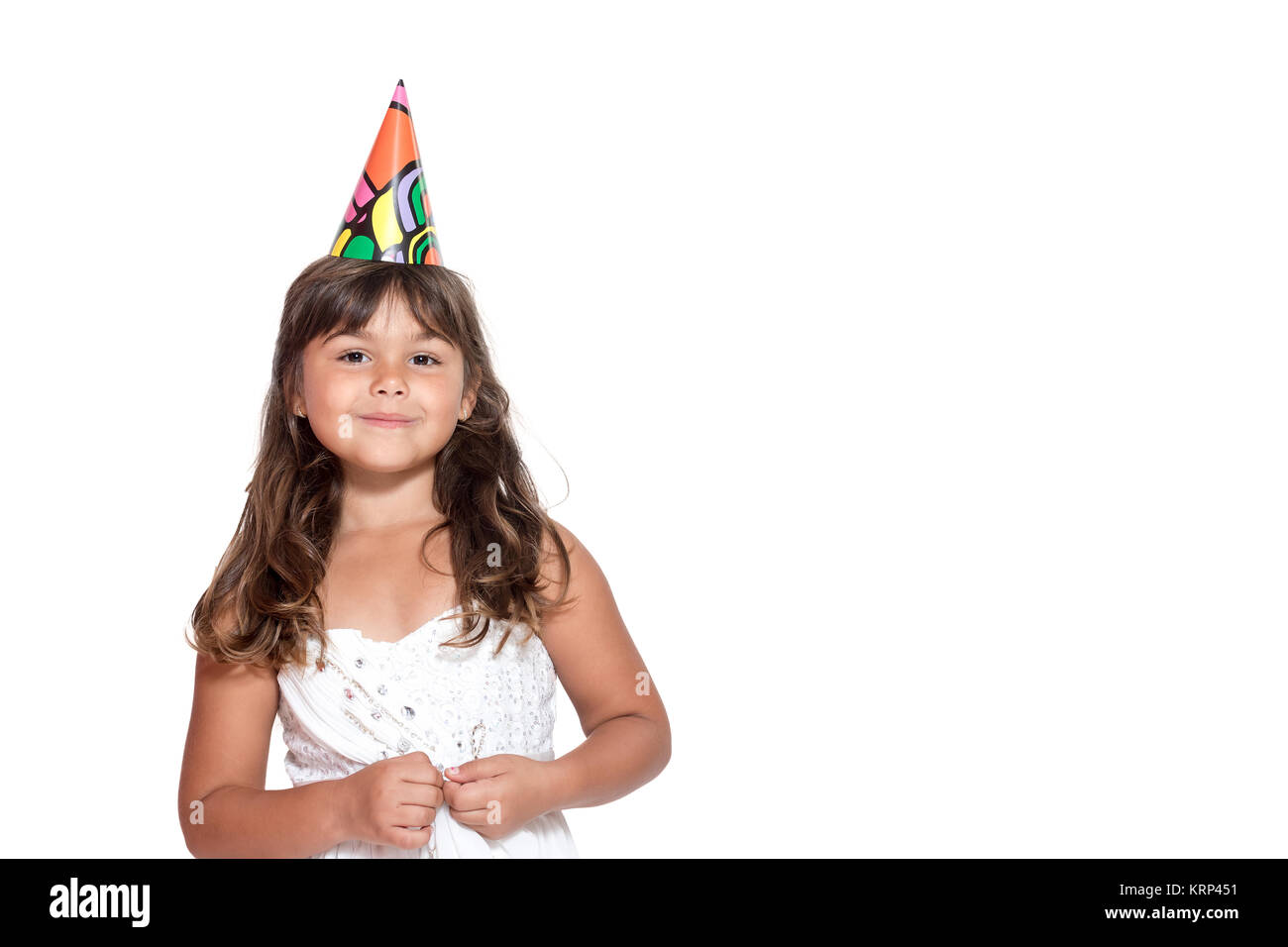 Cute little girl is standing facing the camera isolated Stock Photo - Alamy