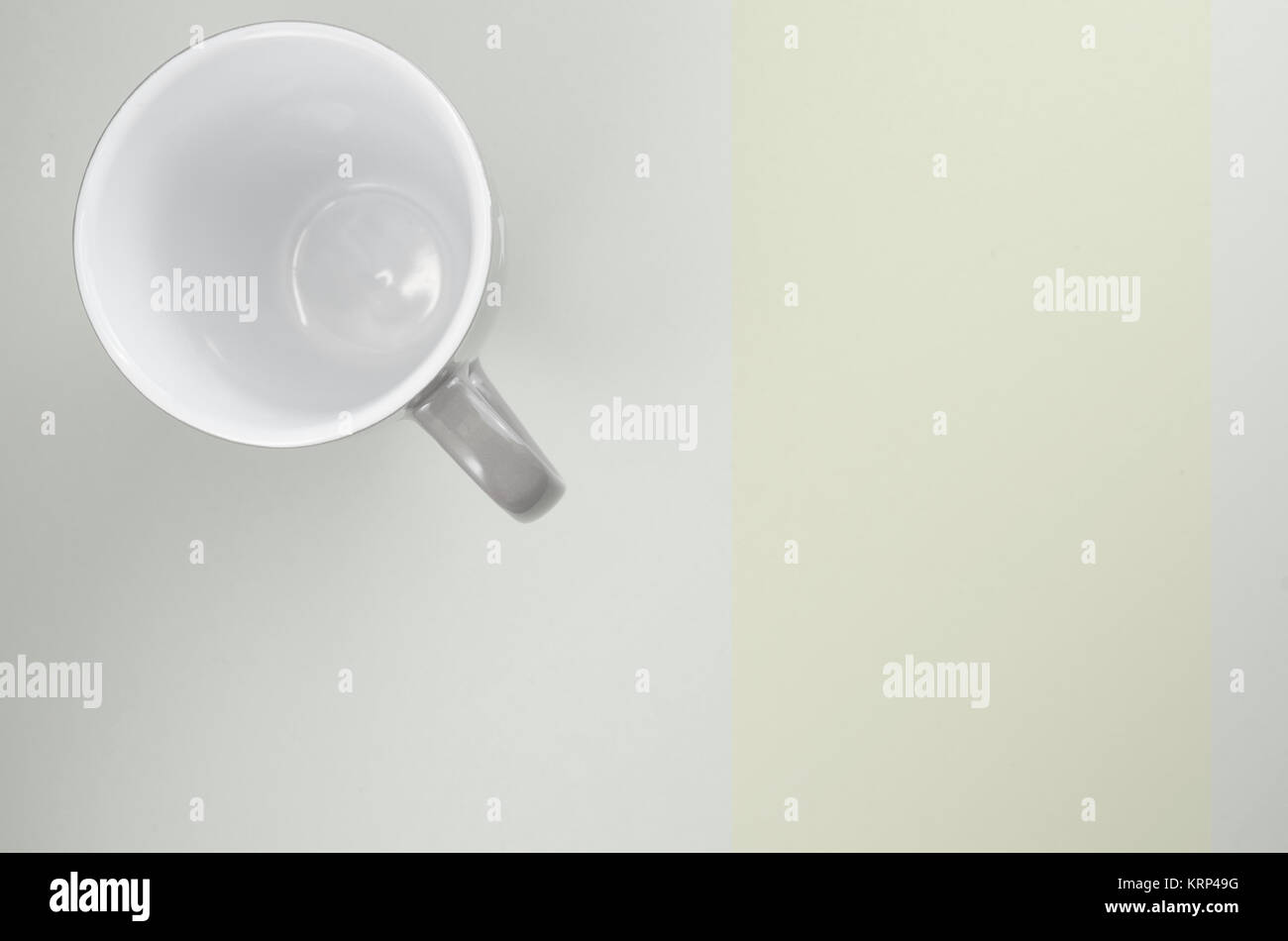 simple design empty ceramic mug with white interior - directly above ...