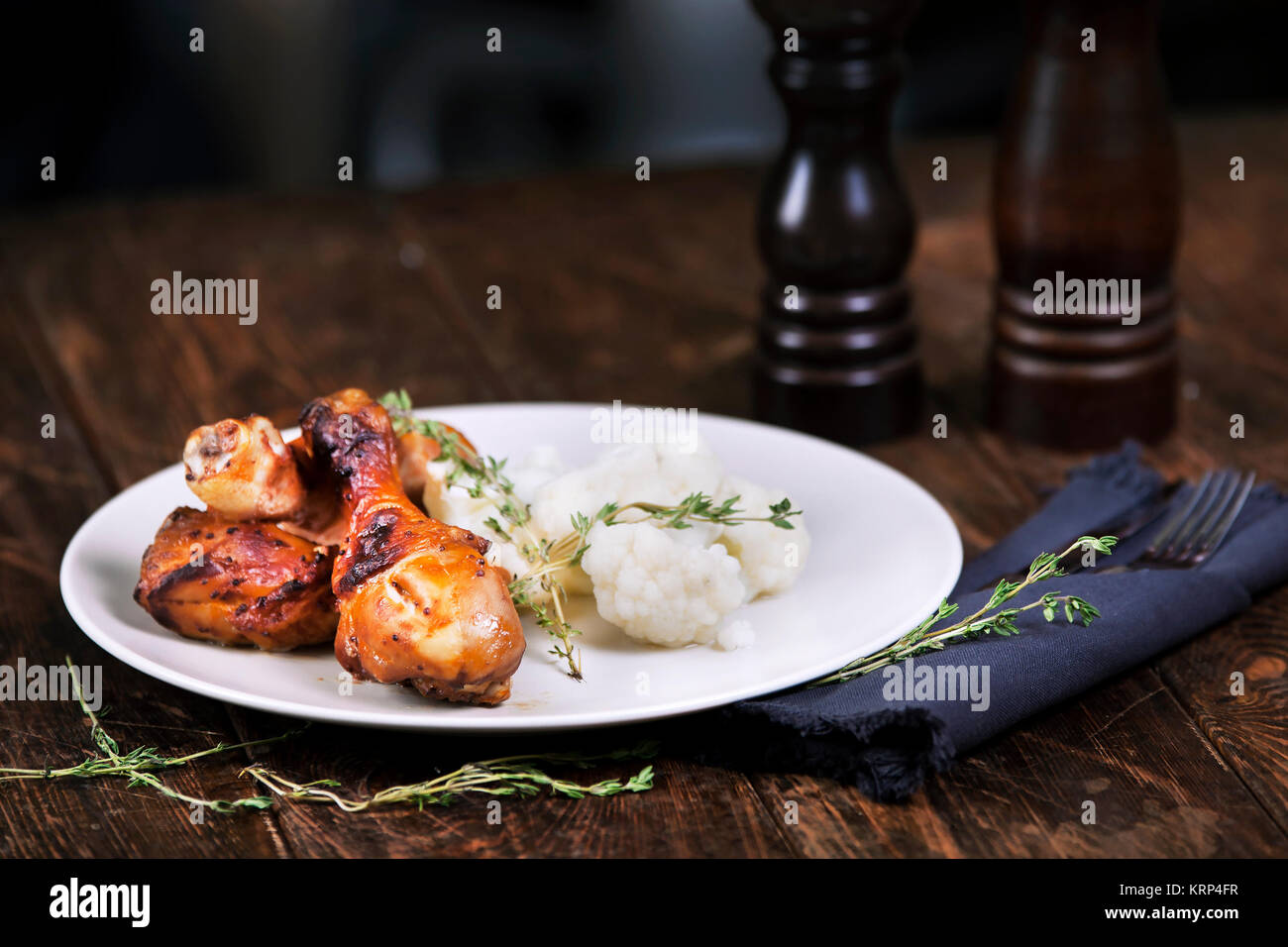 Cauliflower with chicken legs Stock Photo - Alamy