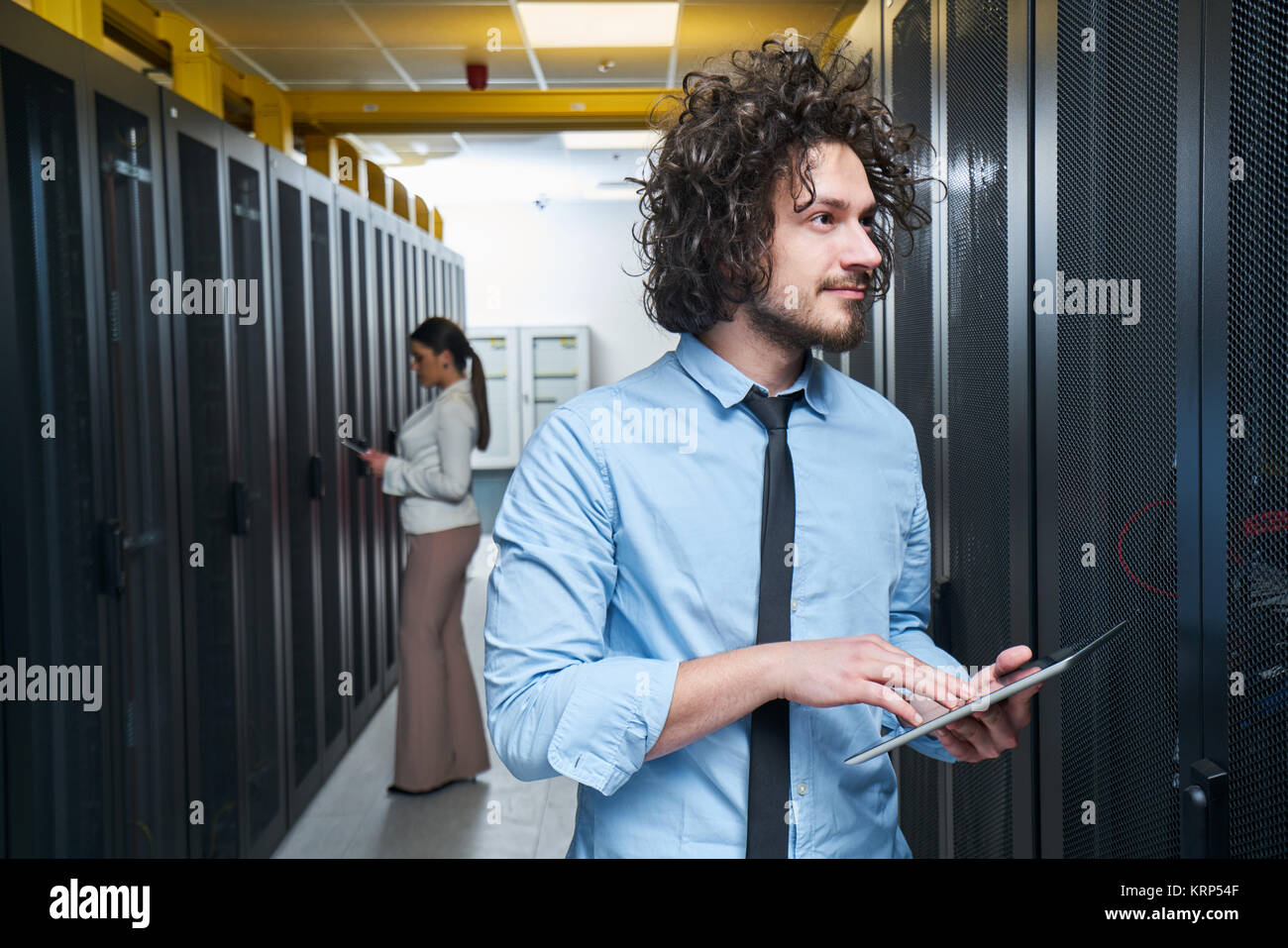 Young technician working Stock Photo - Alamy