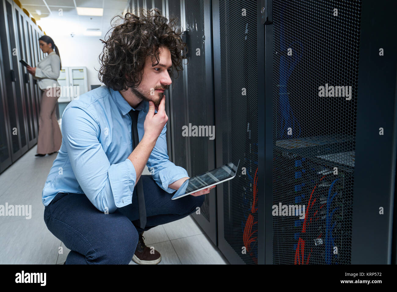 Young technician working Stock Photo - Alamy