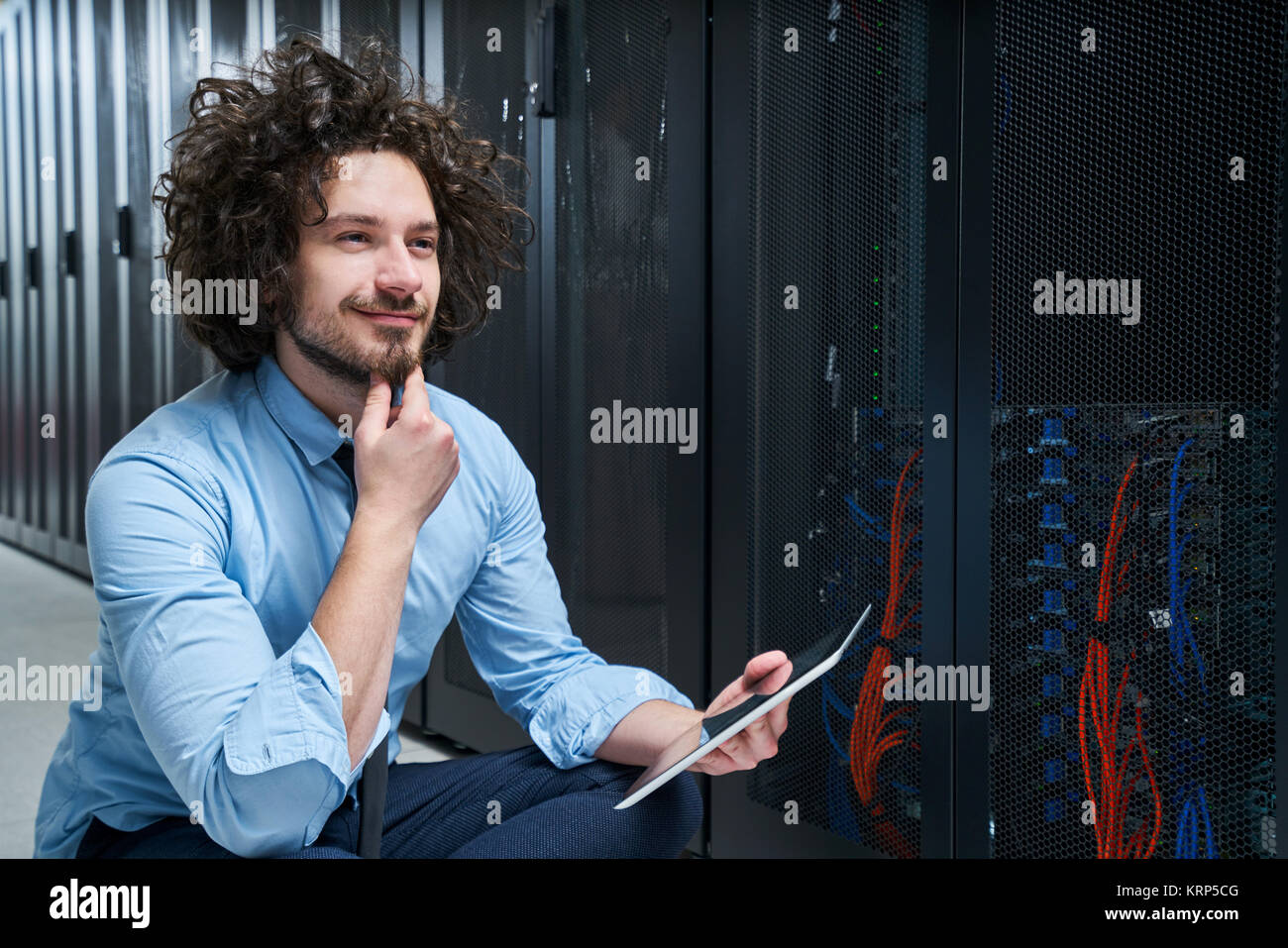 Young technician working Stock Photo - Alamy