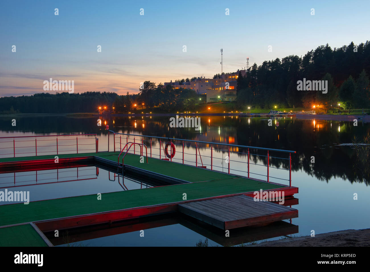 Beach on a forest lake at night Stock Photo - Alamy