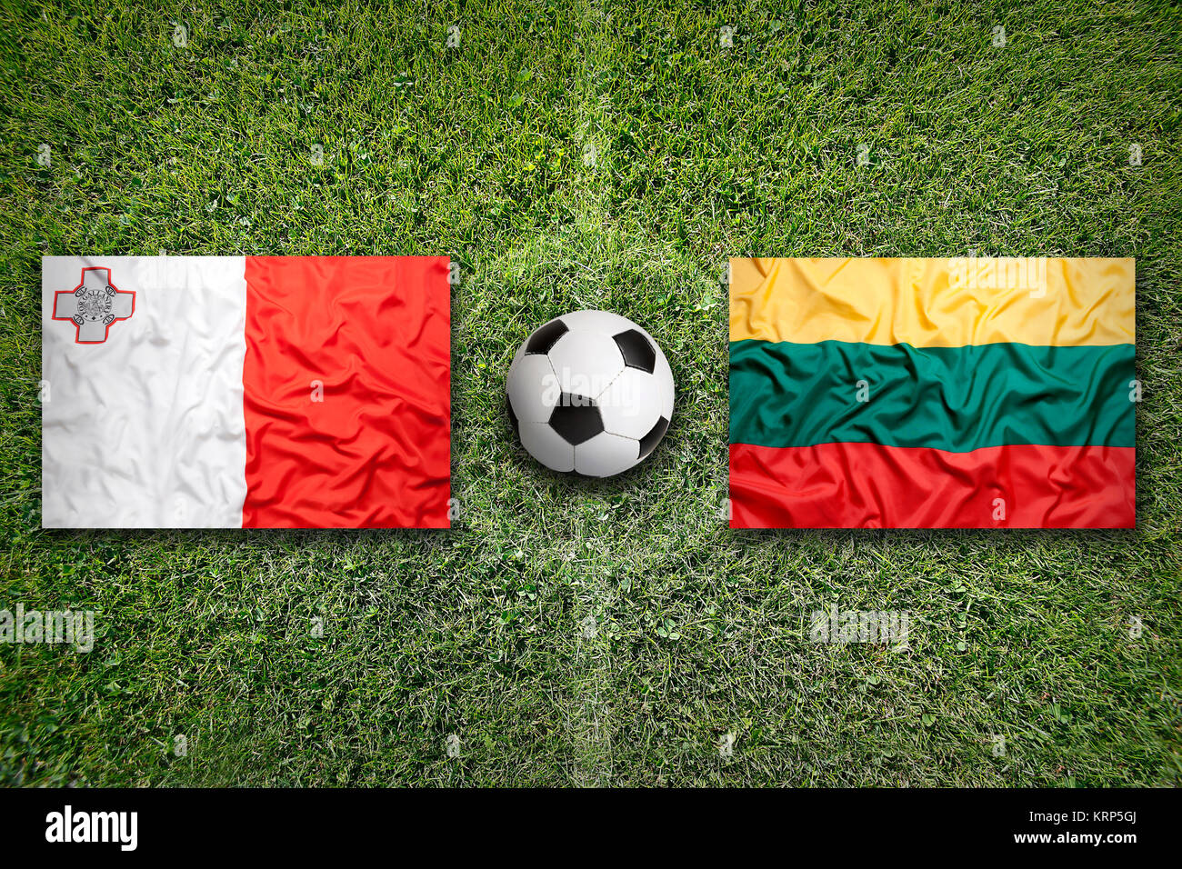 Malta vs. Lithuania flags on soccer field Stock Photo - Alamy