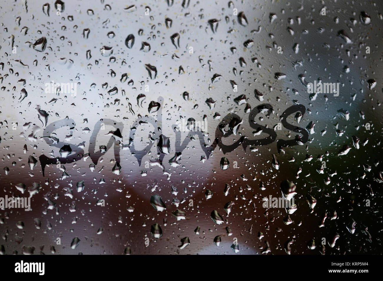 Sadness written on rainy window Stock Photo - Alamy