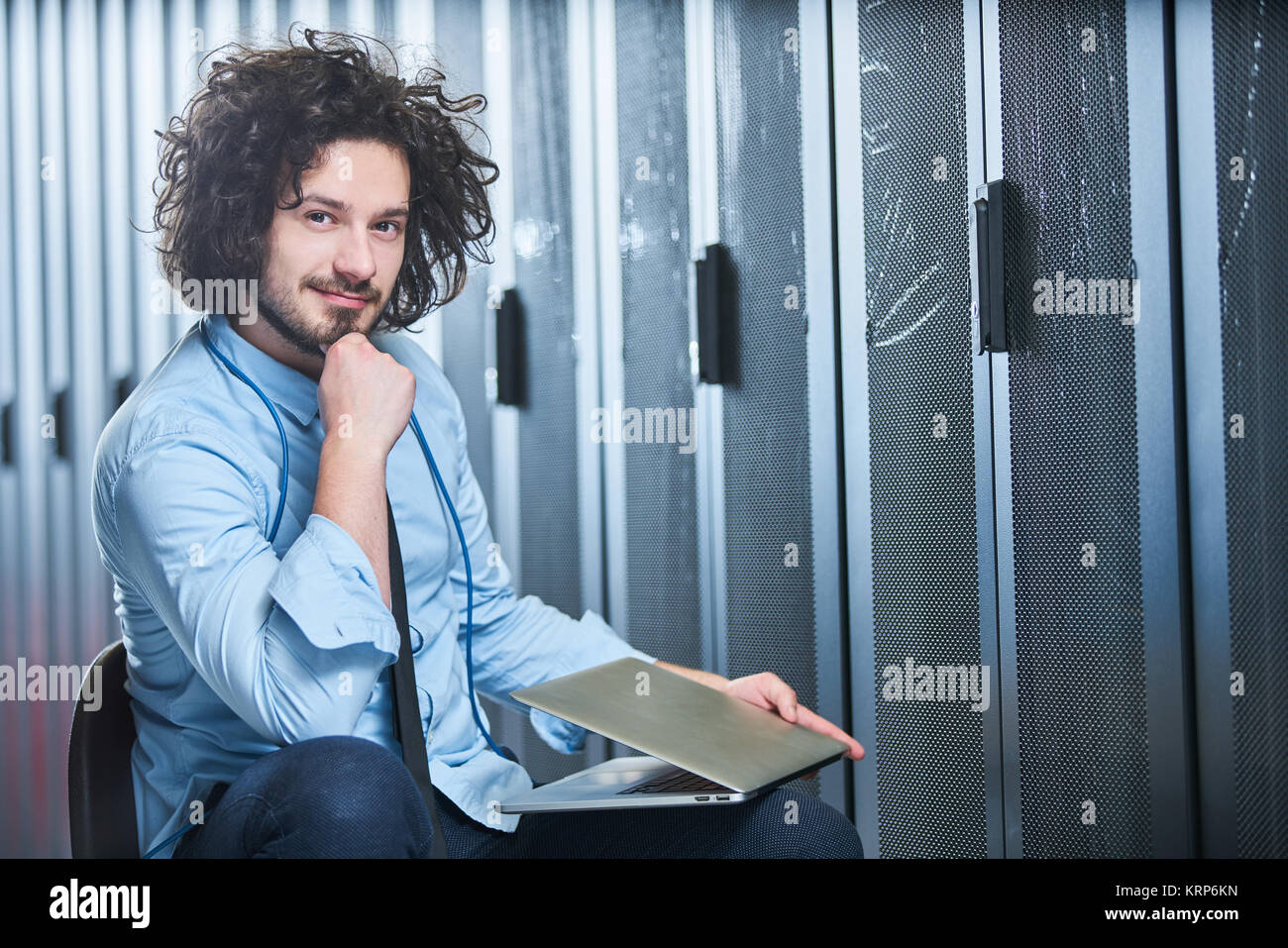 Young technician working Stock Photo - Alamy