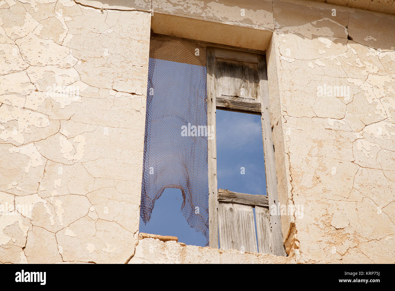 Detail of a ruined house showing window and window frame Stock Photo ...