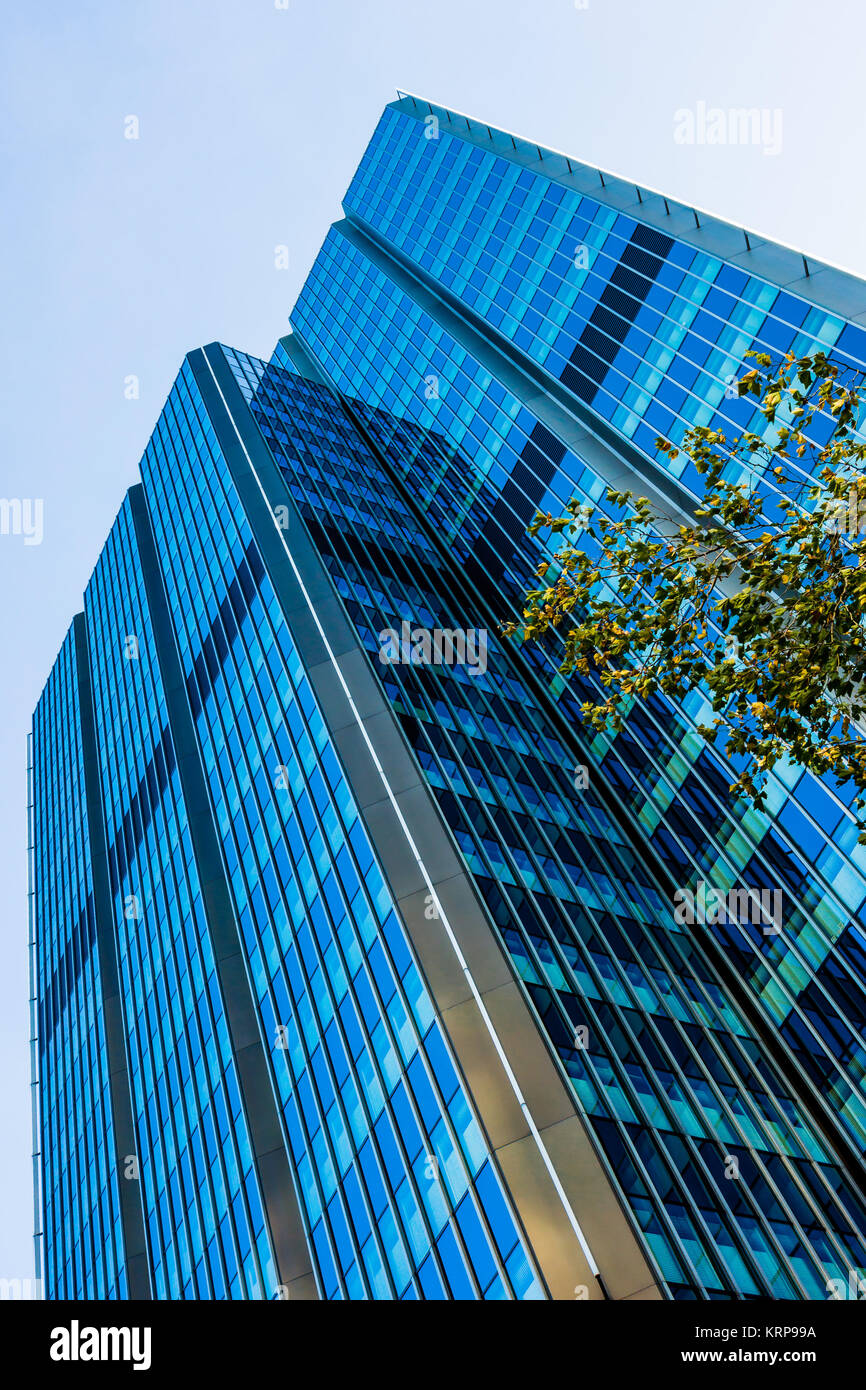 Blue skyscraper facade. office buildings. modern glass silhouettes of ...