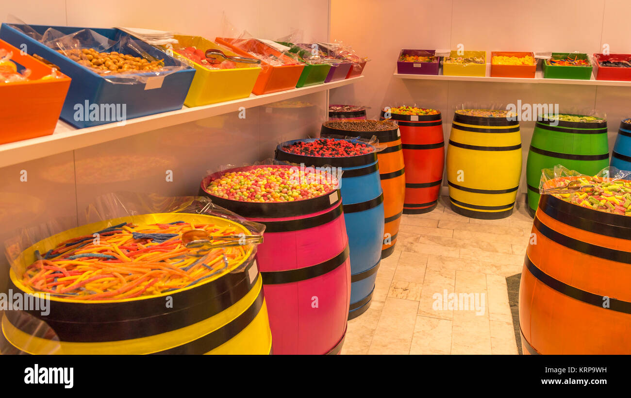 Wooden barrels filled with colorful candies Stock Photo - Alamy