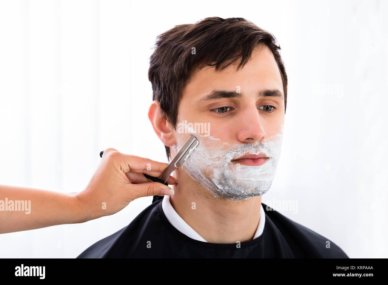 Young woman holding cut razor hi-res stock photography and images - Alamy