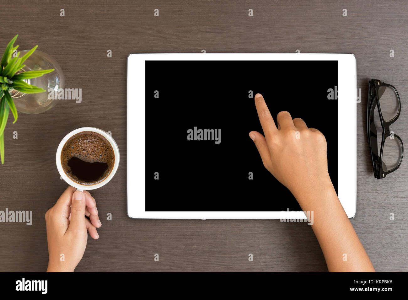 hand use white tablet on desk table top view Stock Photo - Alamy