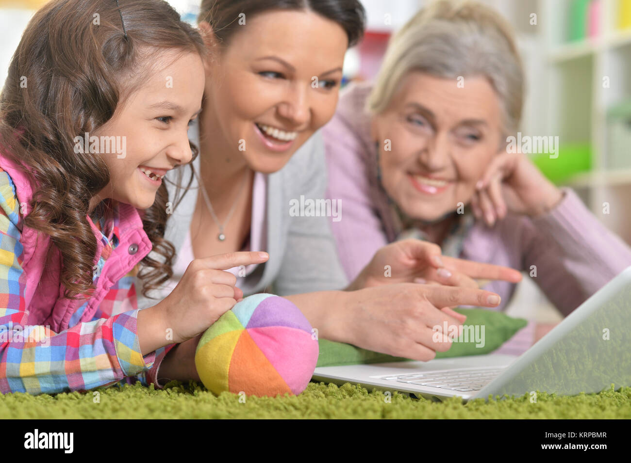 happy family using laptop Stock Photo - Alamy