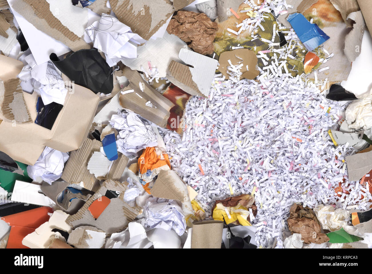 papers inside a container to be recycled Stock Photo - Alamy