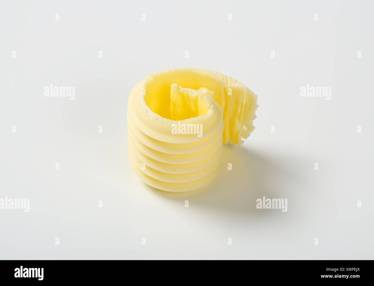 fresh butter curl Stock Photo - Alamy