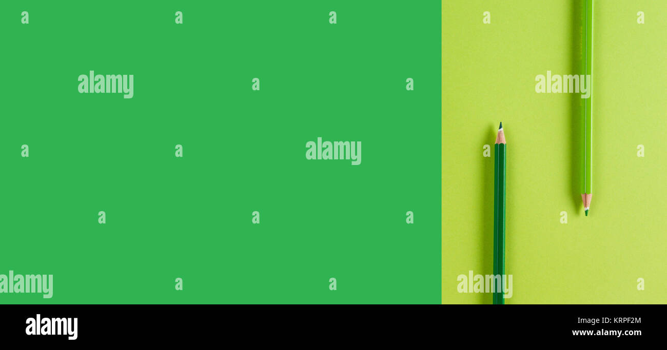Green pencils on pastel green contrast background. Minimal creative ...