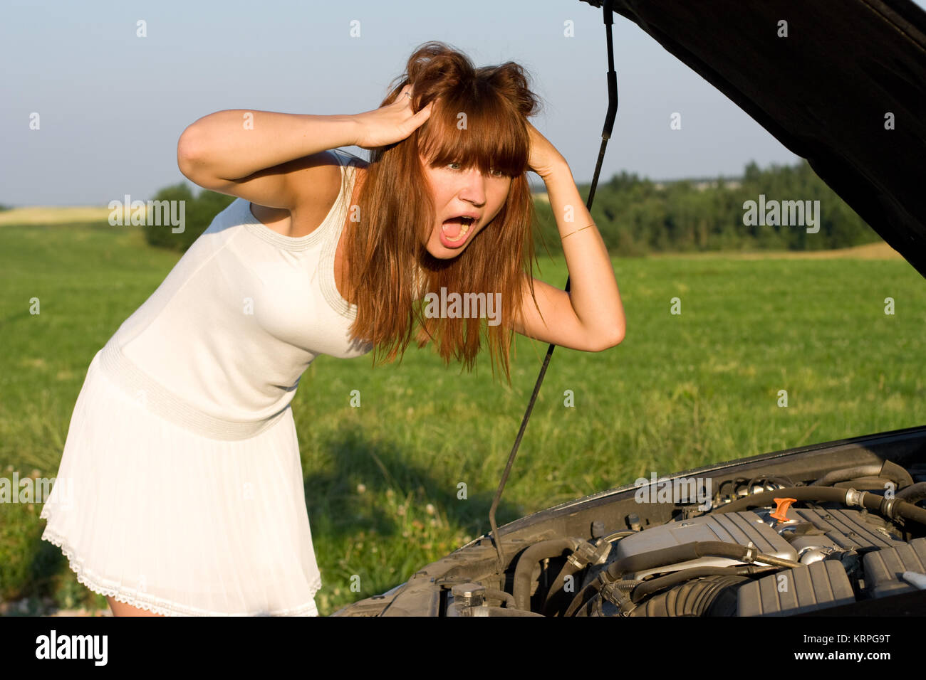 woman bent over car engine Stock Photo - Alamy