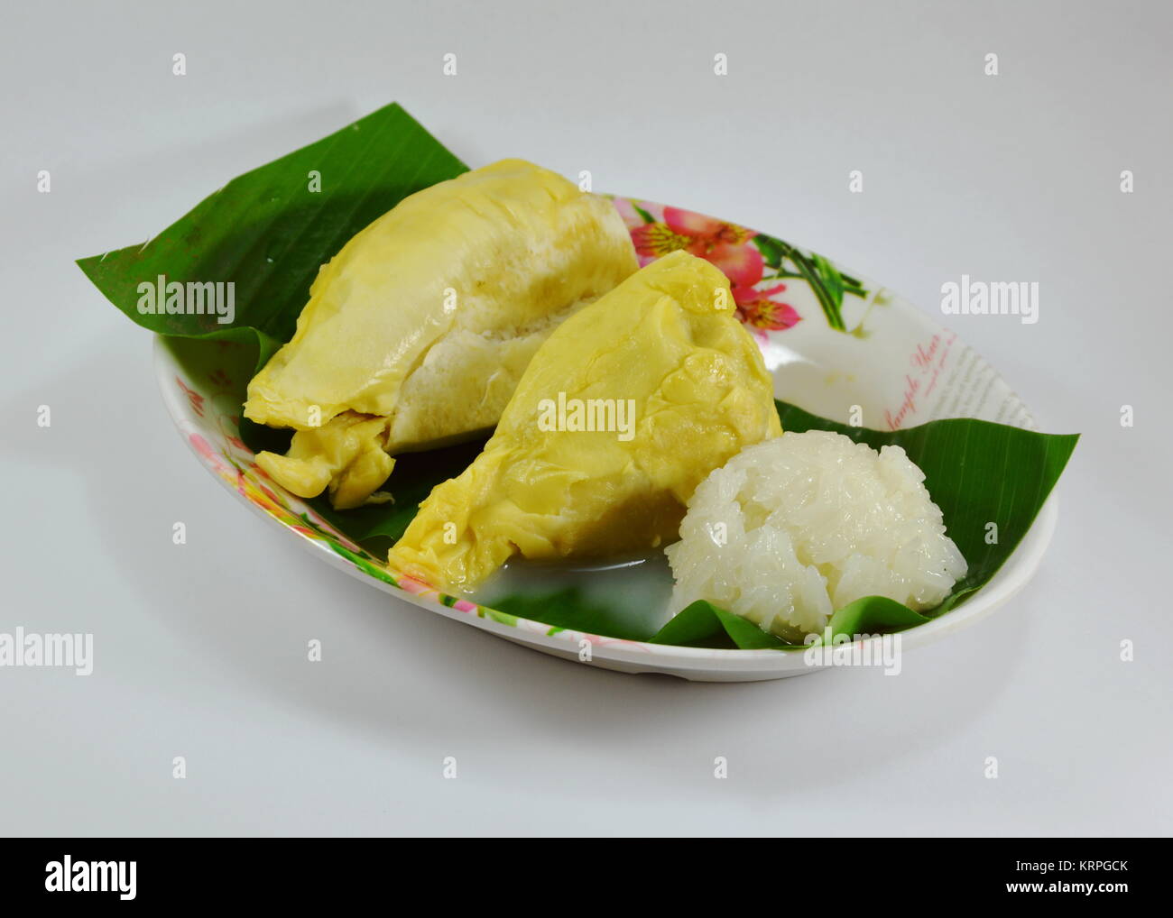 durian and sticky rice dressing with coconut milk Stock Photo - Alamy