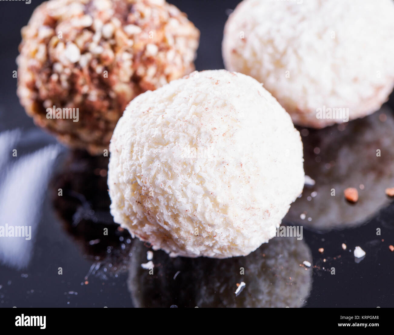 White truffle over black background Stock Photo - Alamy