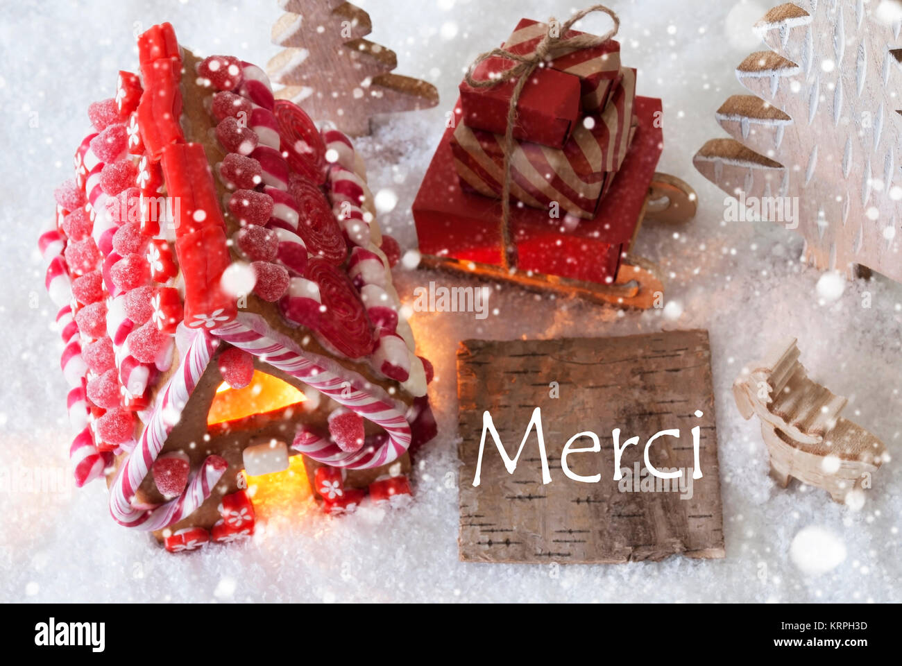 Label With French Text Merci Means Thank You. Gingerbread House On Snow ...