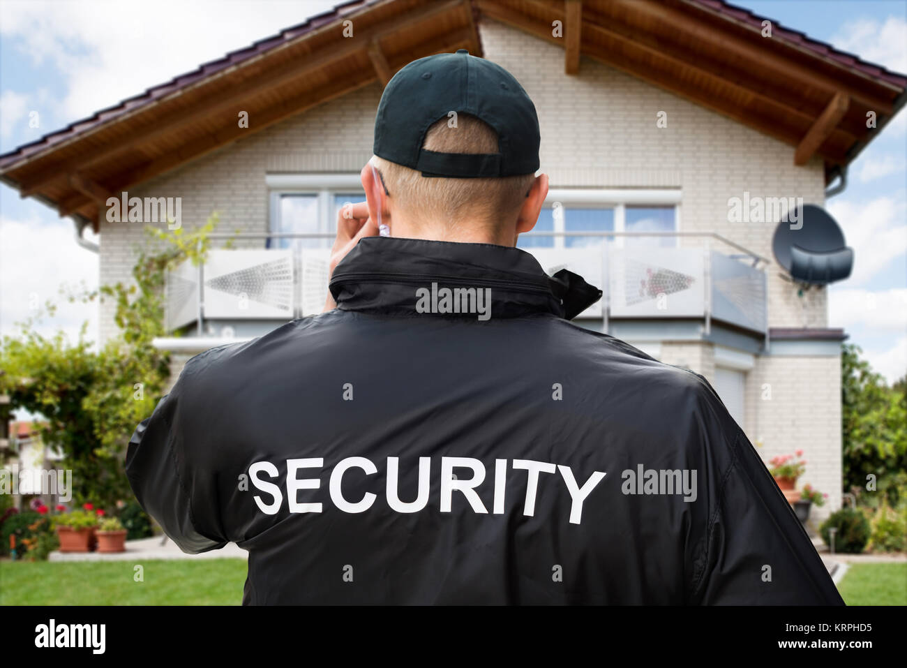Security Guard Wearing Jacket Stock Photo - Alamy