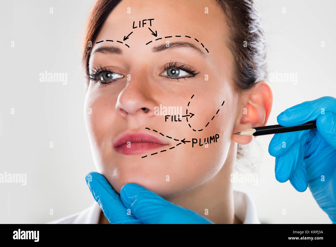 Woman marked plastic surgery hi-res stock photography and images - Alamy
