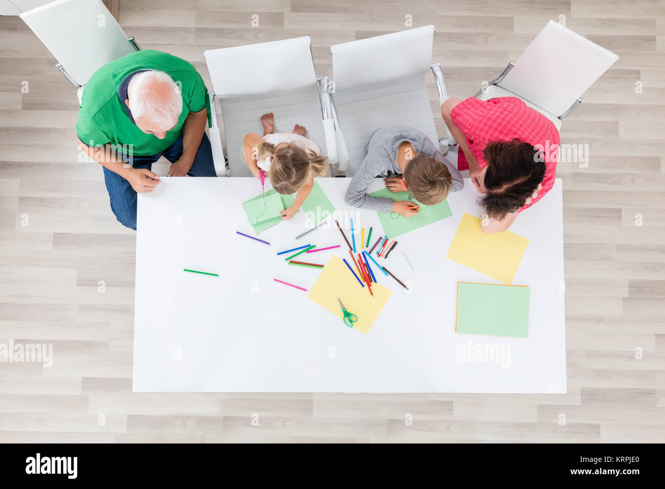 Multi Generation Family Doing Arts And Crafts Together Stock Photo - Alamy