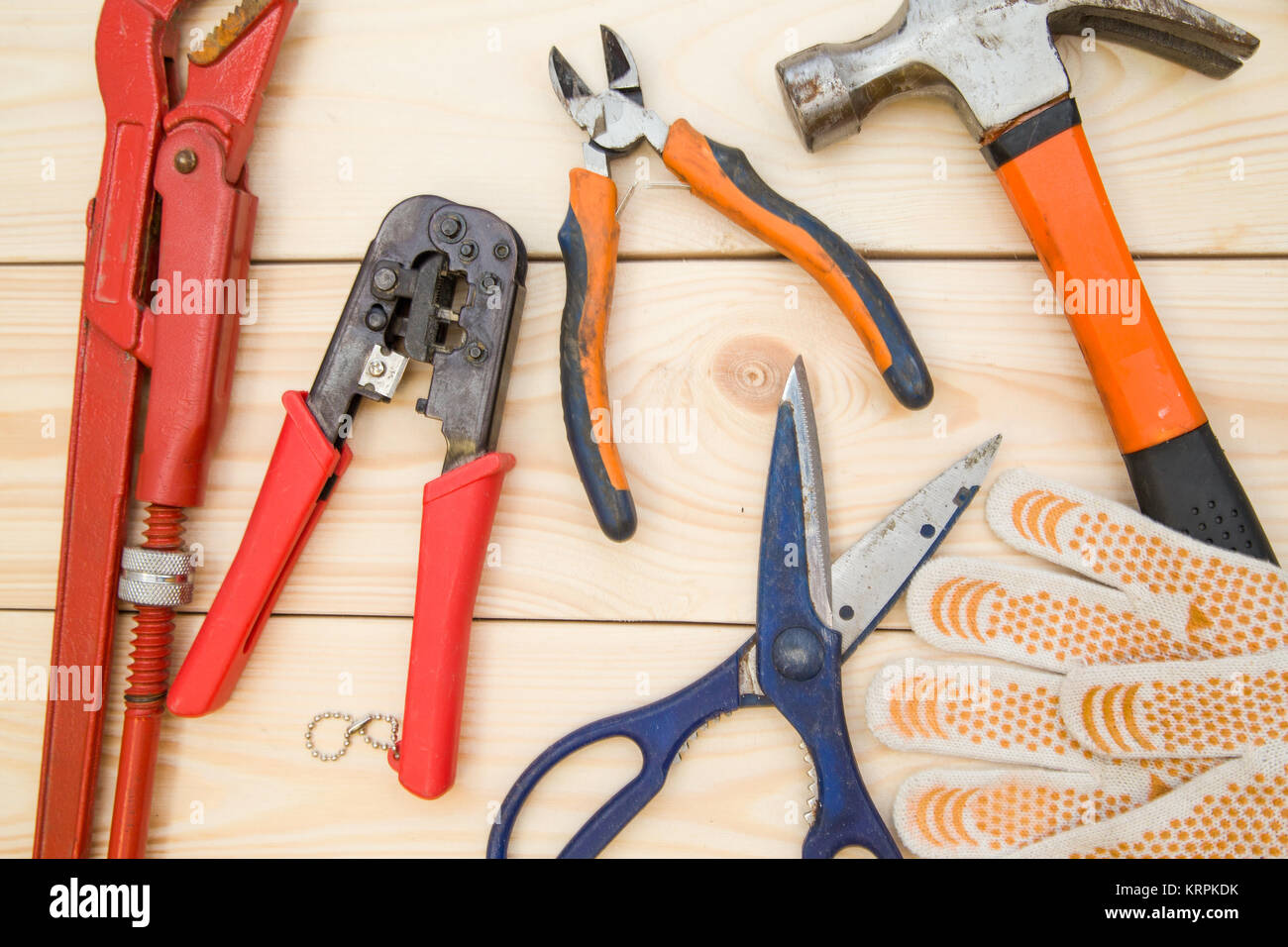 Renovating a house. A set of bright repair tools -pilers, scissors, a ...