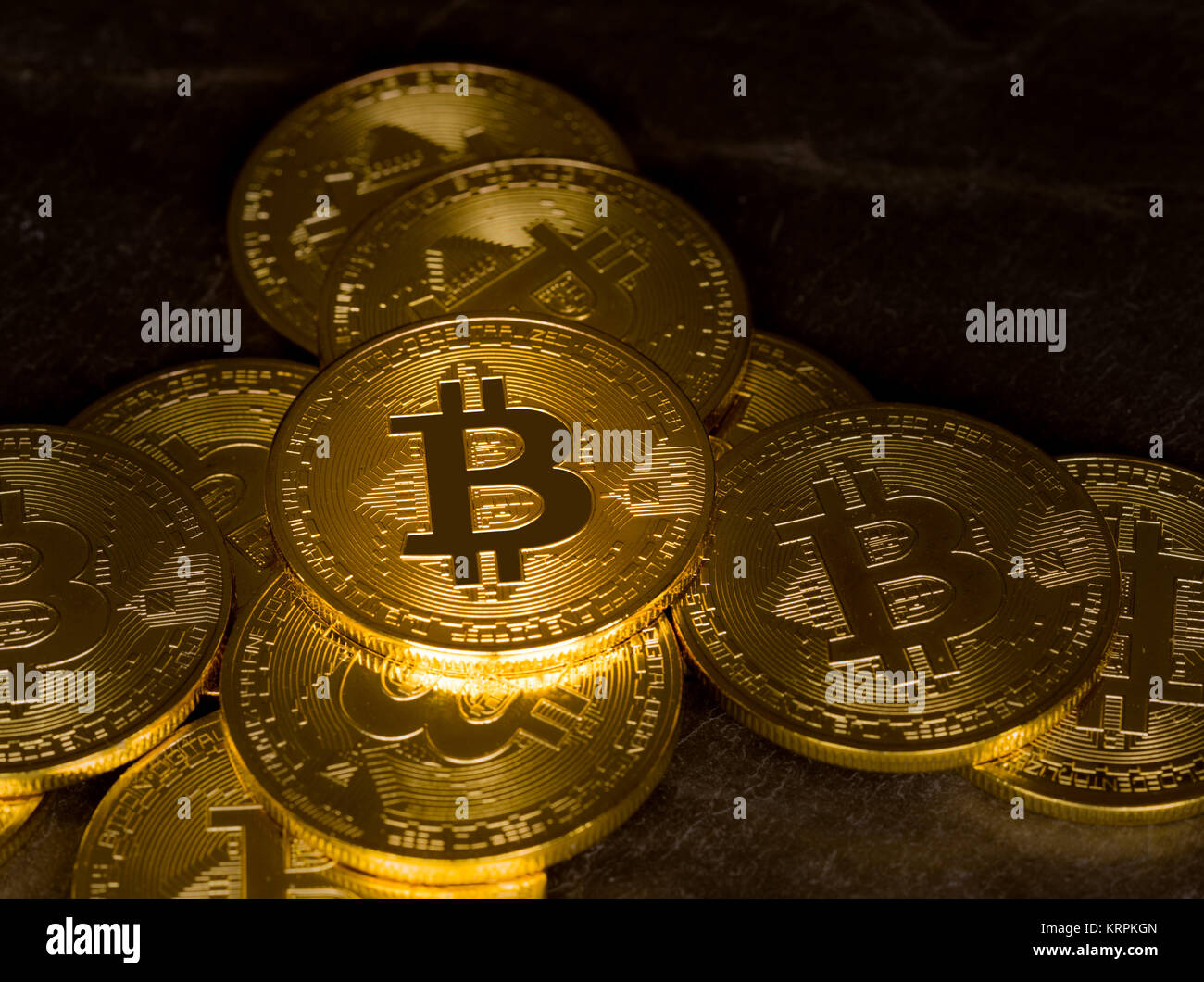 Stack of bitcoins with slate background Stock Photo - Alamy