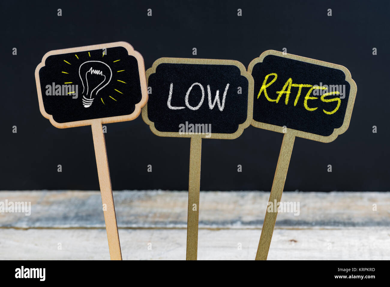 Concept message LOW RATES and light bulb as symbol for idea Stock Photo ...