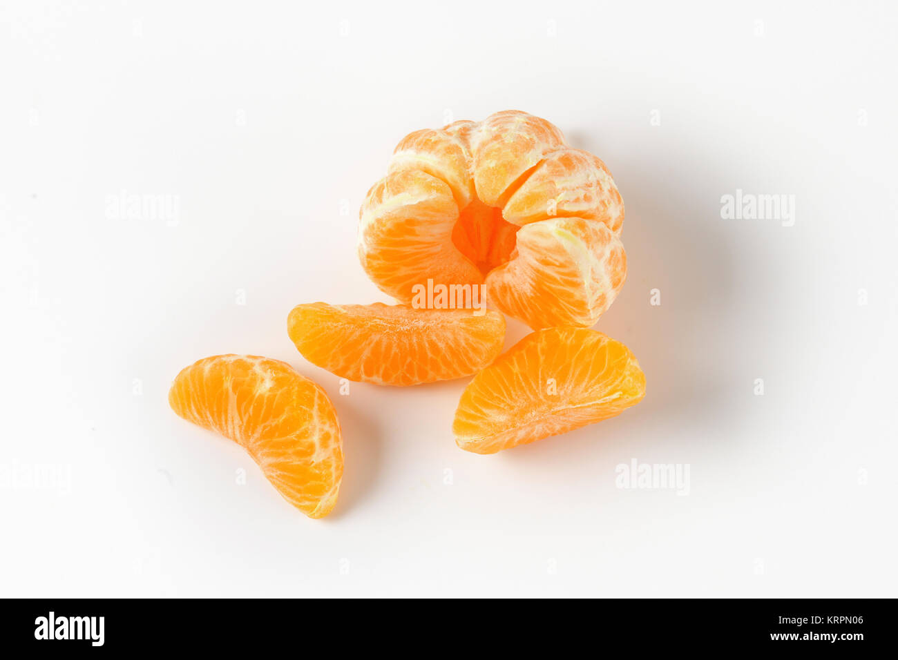 peeled ripe tangerine Stock Photo - Alamy