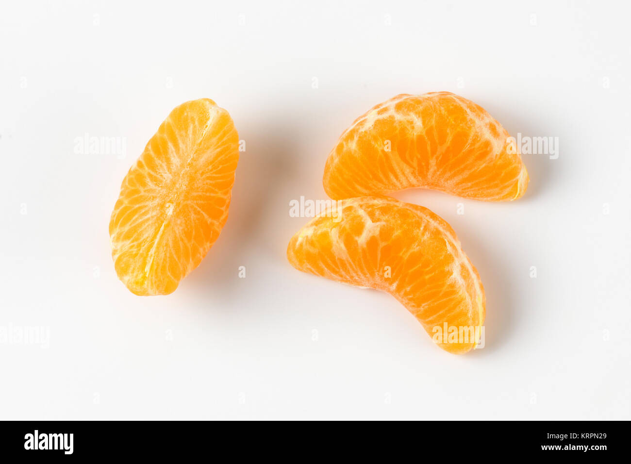 Peeled mandarin segments Stock Photo - Alamy