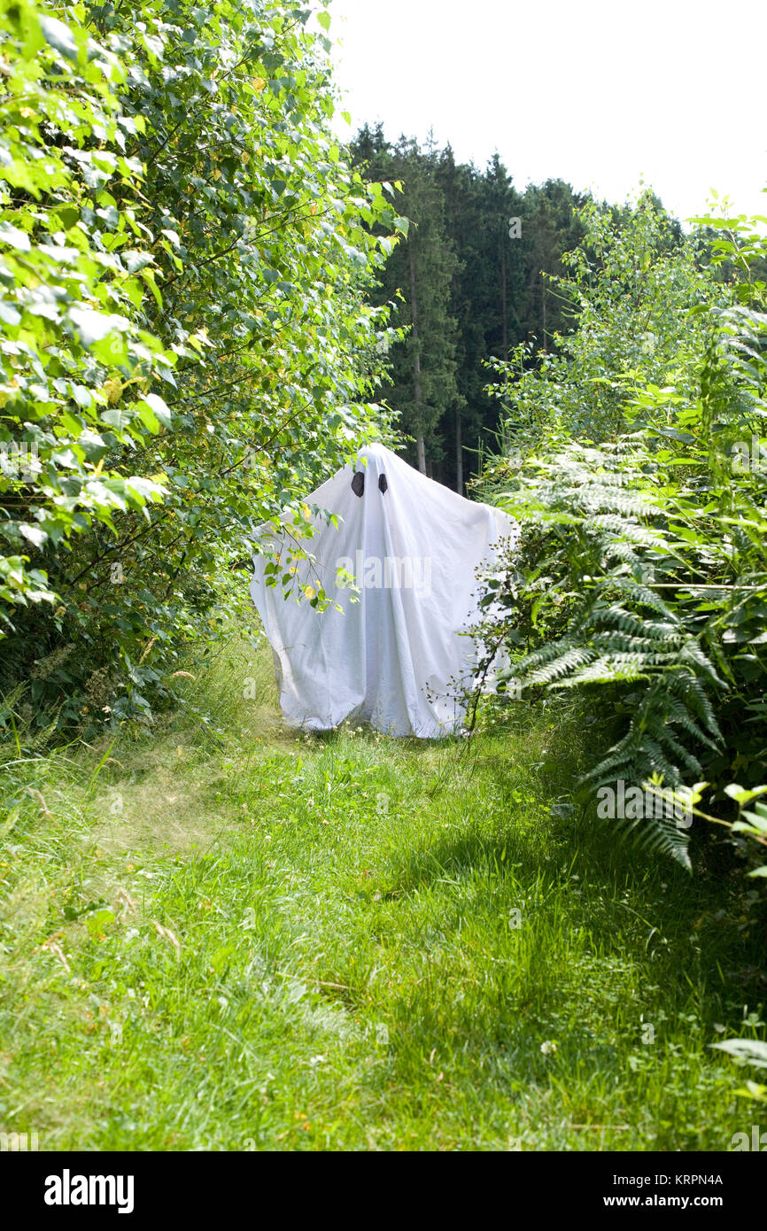 a white ghost in forest Stock Photo - Alamy