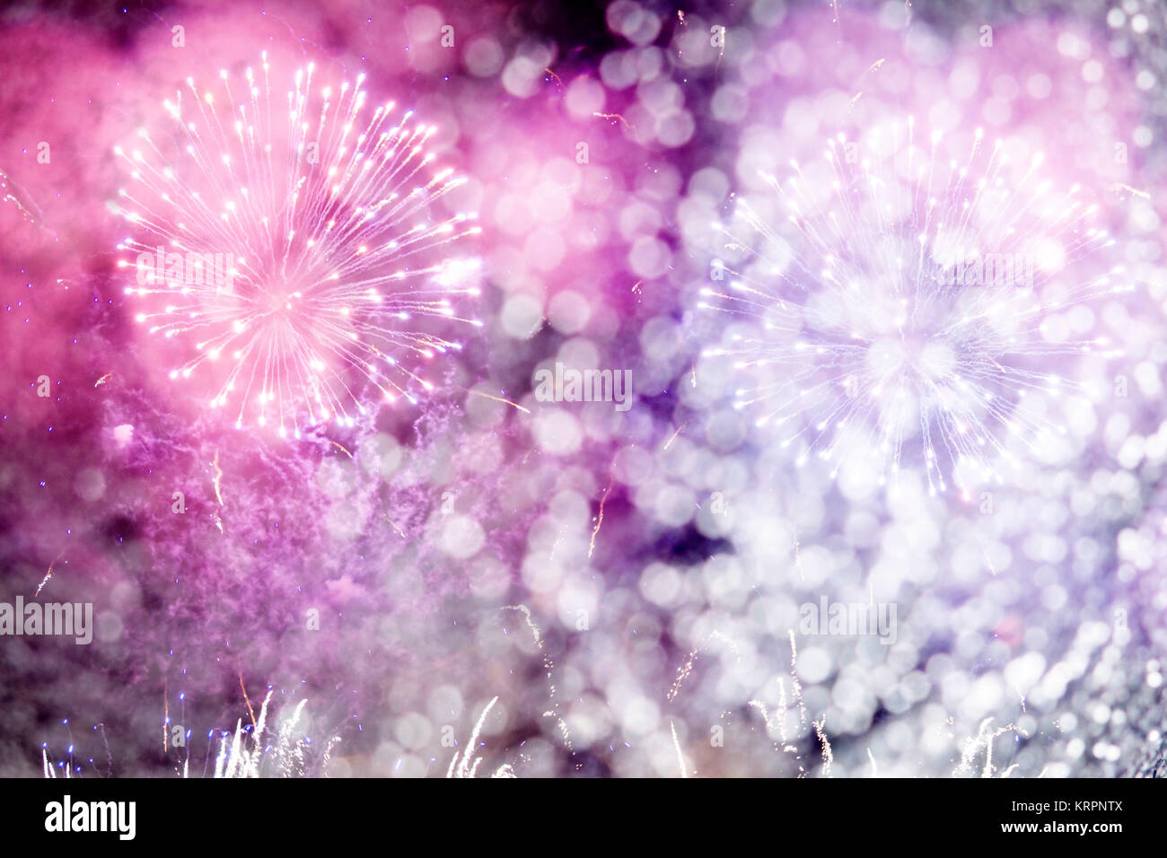 Abstract holiday background with fireworks and stars Stock Photo - Alamy