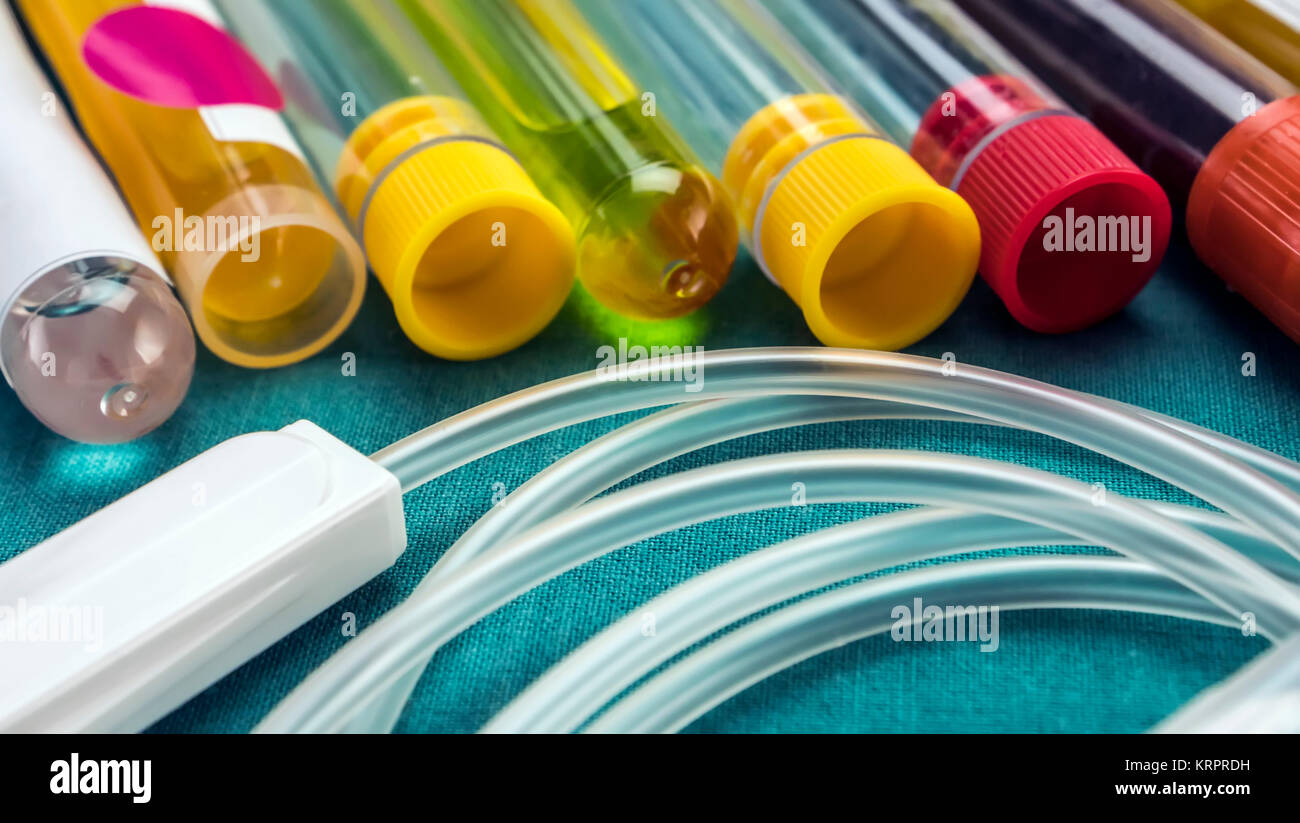 Some vials with samples of contagious diseases and drop in a clinical ...