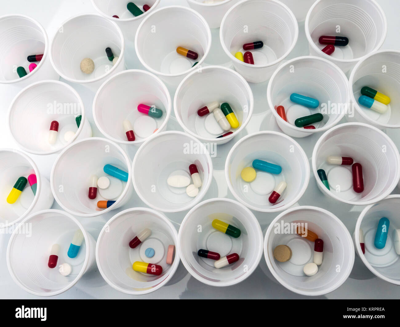 Daily medication at a hospital table, conceptual image Stock Photo - Alamy
