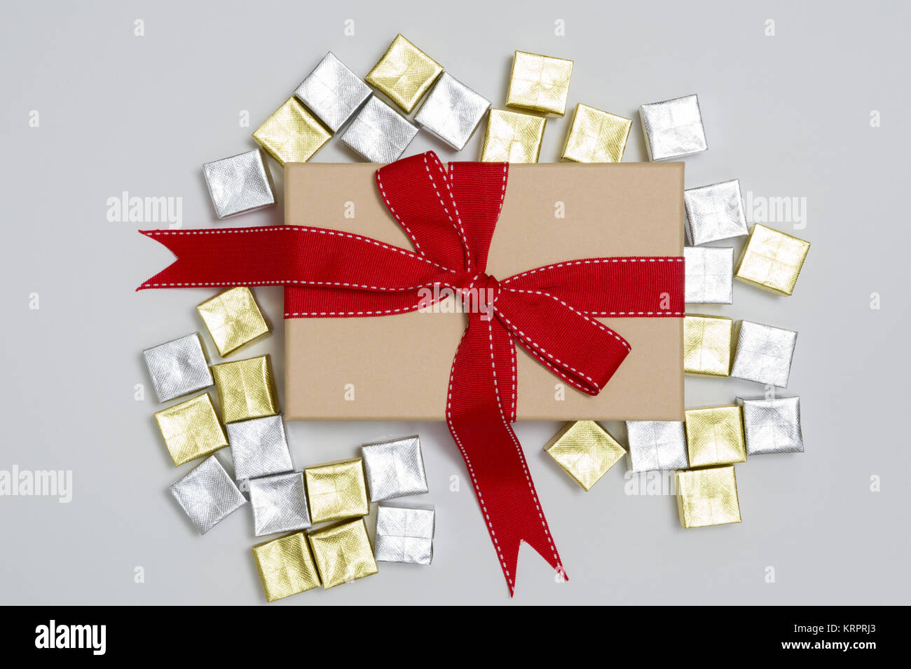 Gift box with red ribbon Stock Photo - Alamy