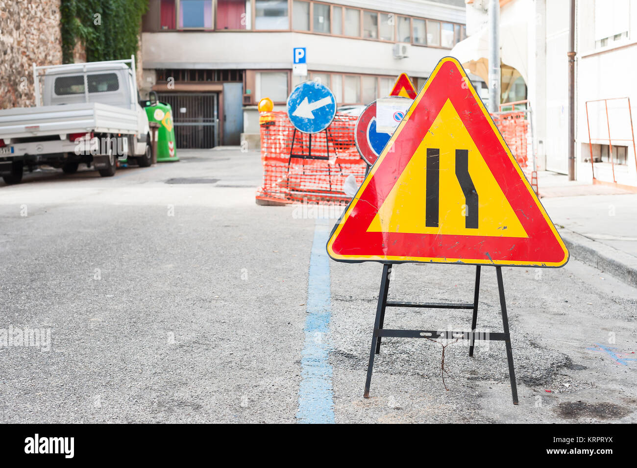 Road sign lane narrowing Stock Photo - Alamy