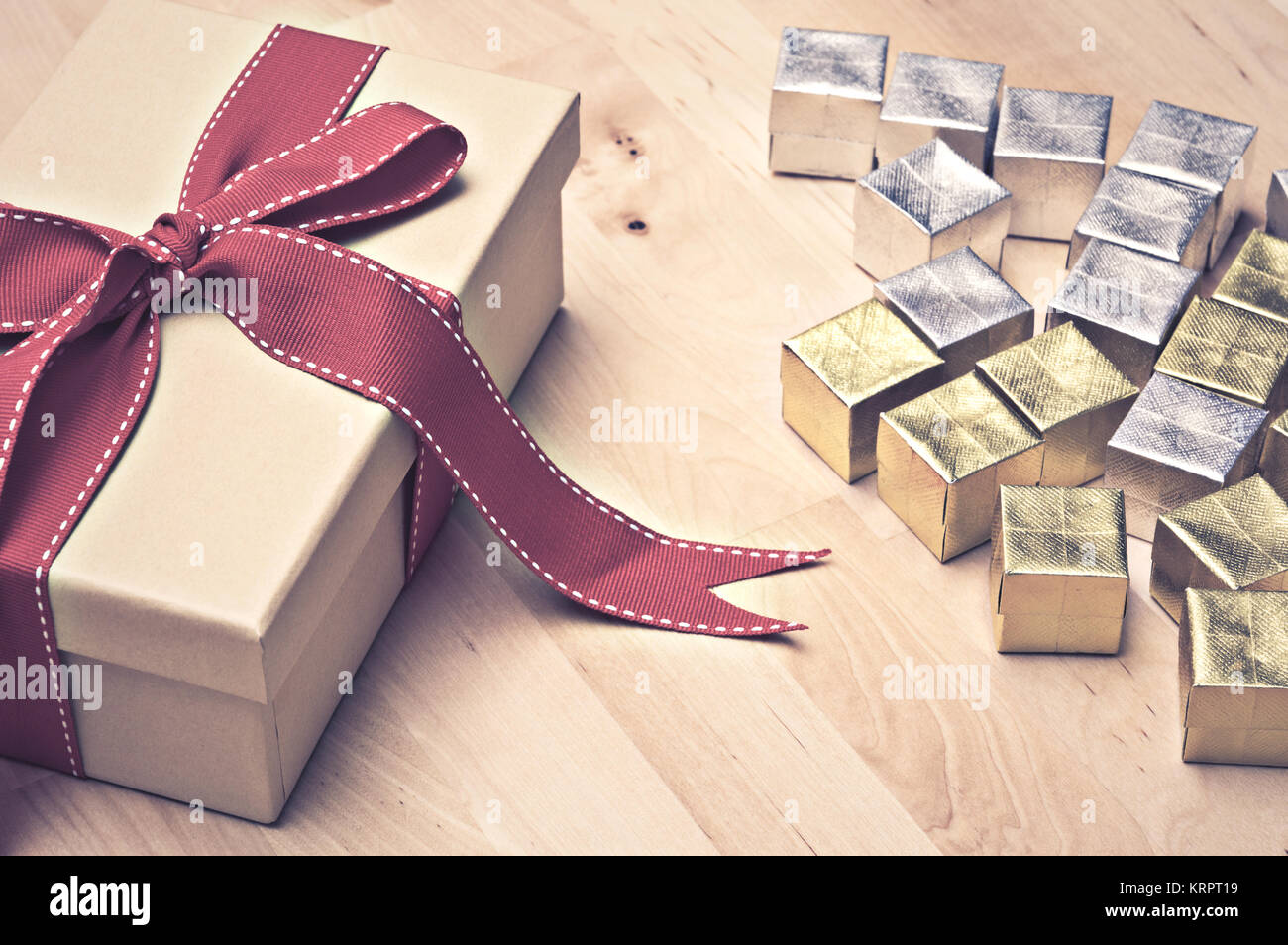 Gift box with red ribbon Stock Photo - Alamy