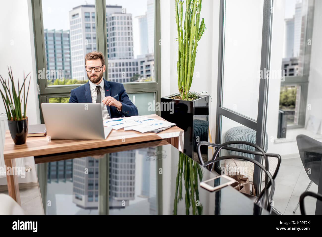 Banker working at the office Stock Photo - Alamy