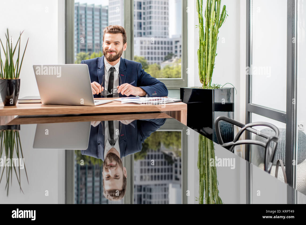 Banker working at the office Stock Photo - Alamy