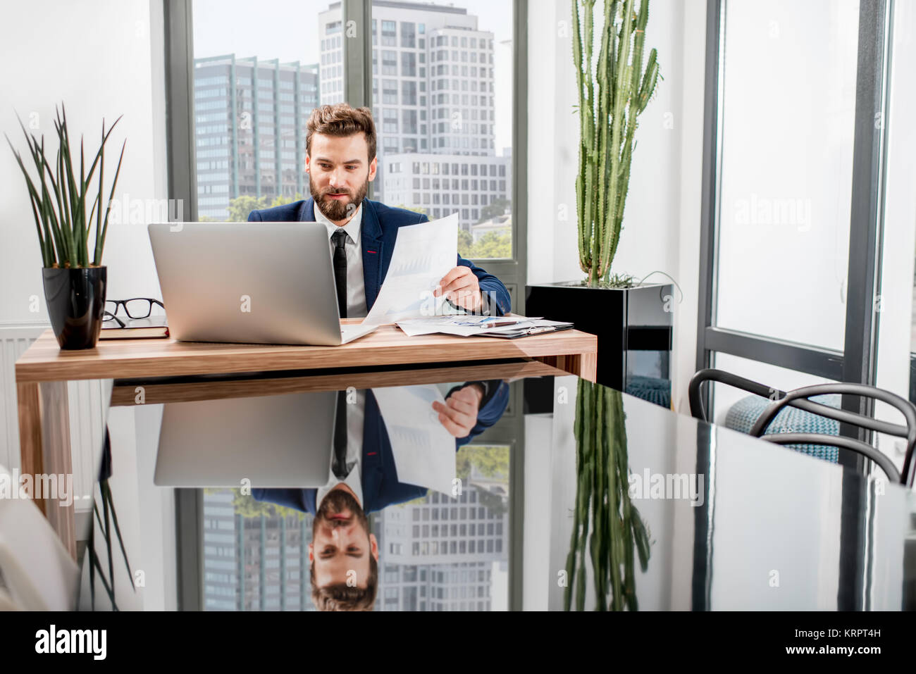 Banker working at the office Stock Photo - Alamy