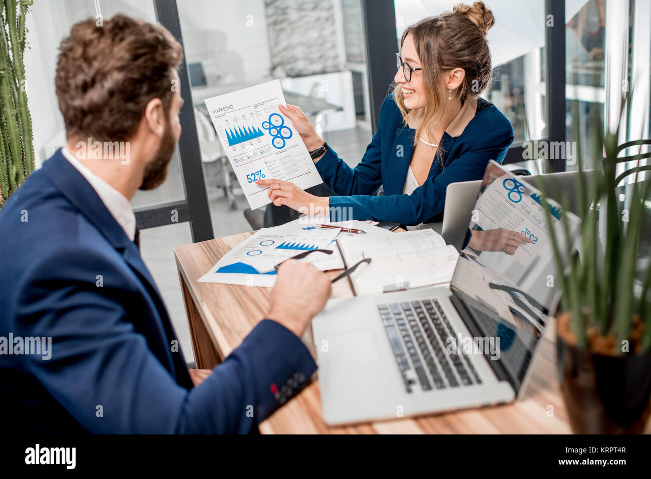 Analytic managers team working at the office Stock Photo - Alamy