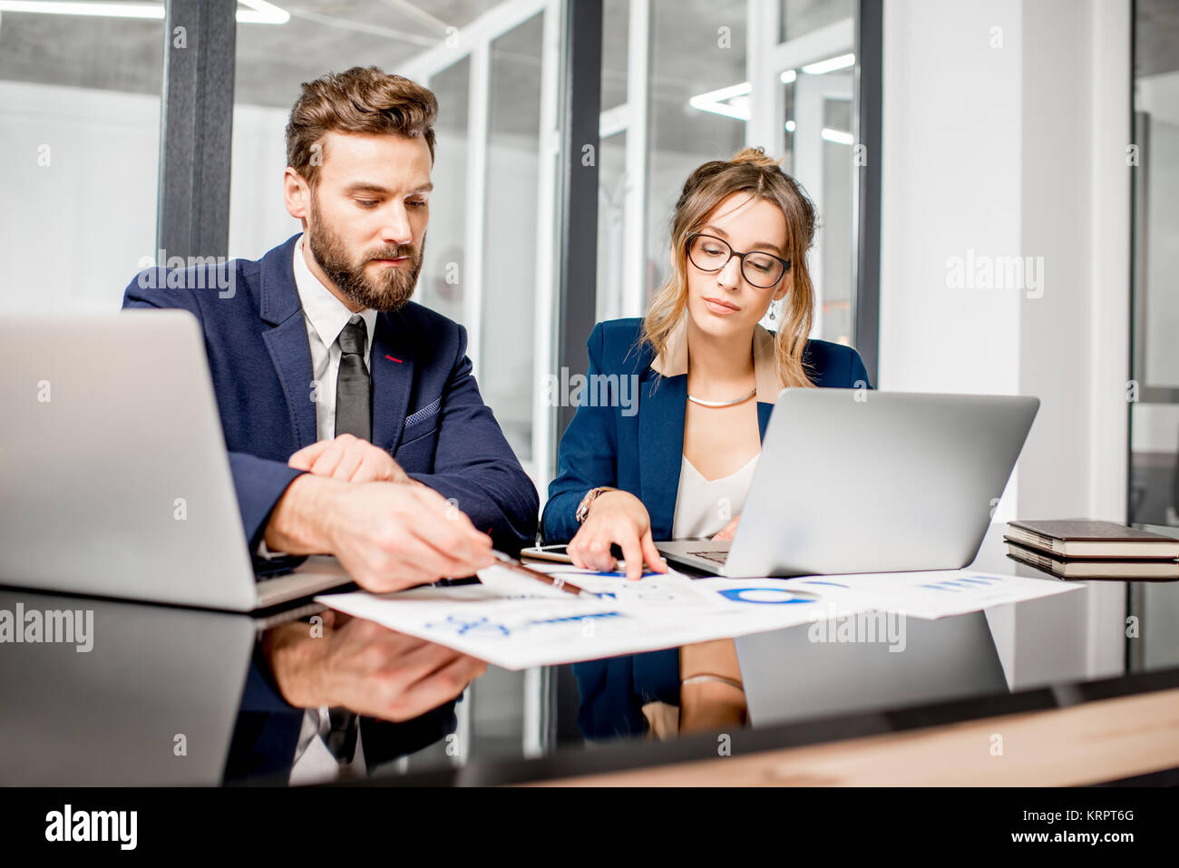 Analytic managers team working at the office Stock Photo - Alamy